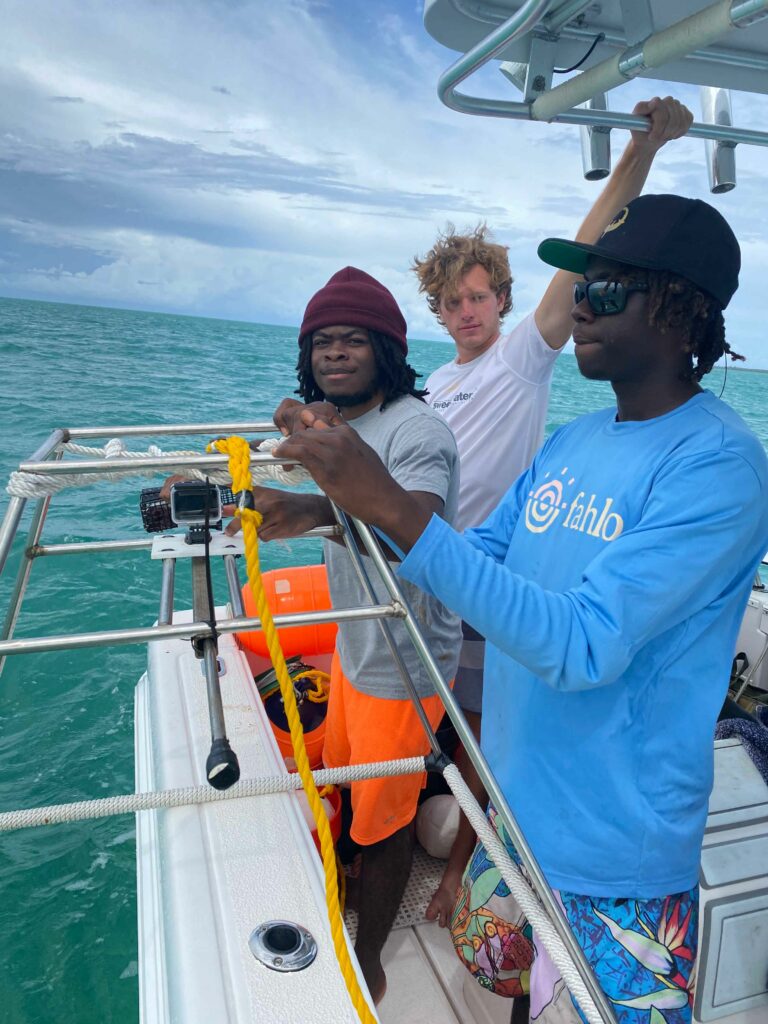 Tayshaun deploying BRUVS with the Saving the Blue crew.